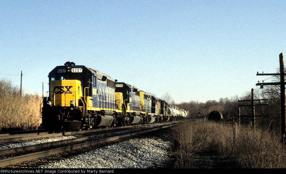 CSX 6207 and 8184 and Three Sisters Roll a Freight